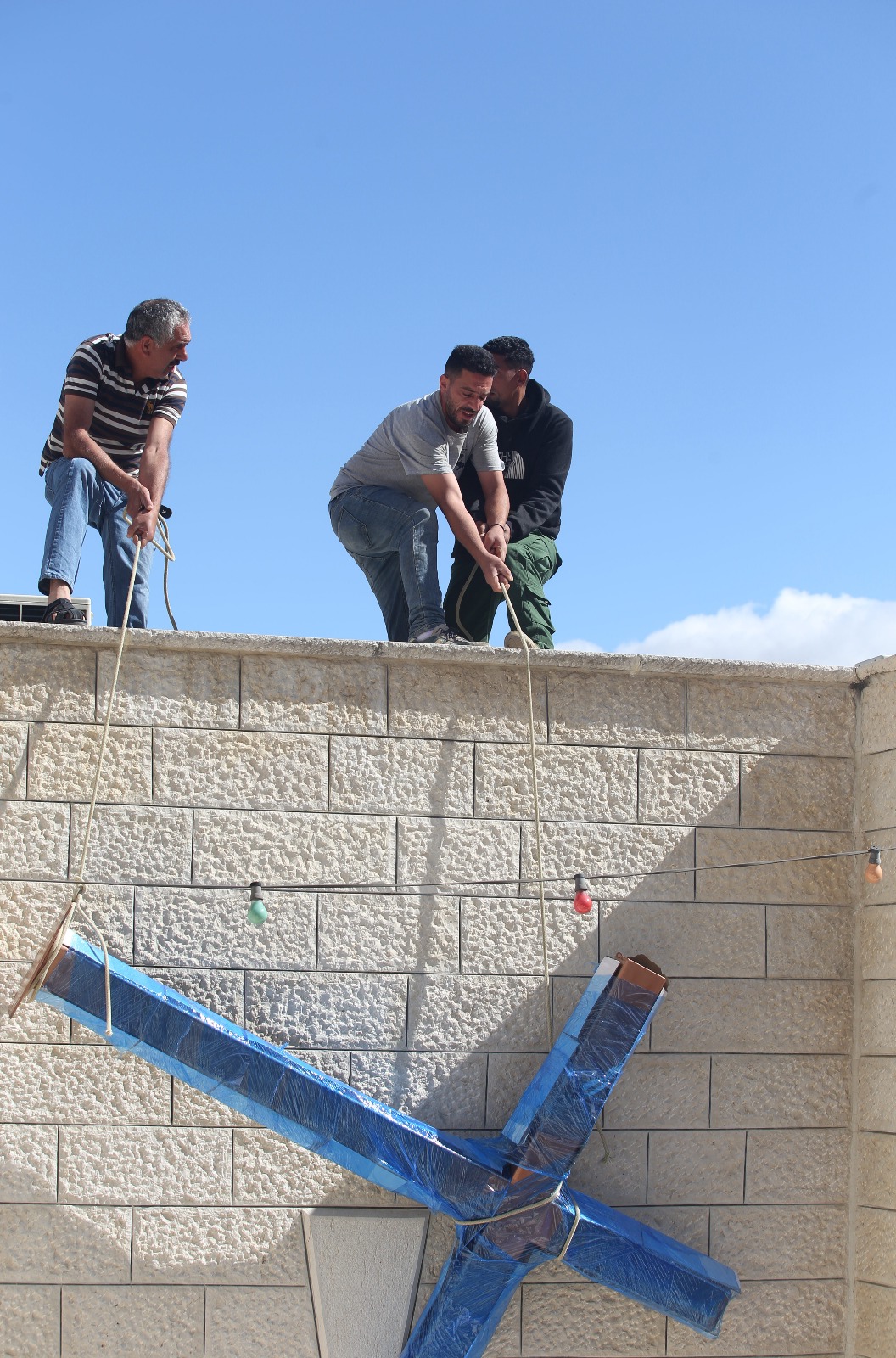 Pulling Up Side of Building | Christian Cross Ministries