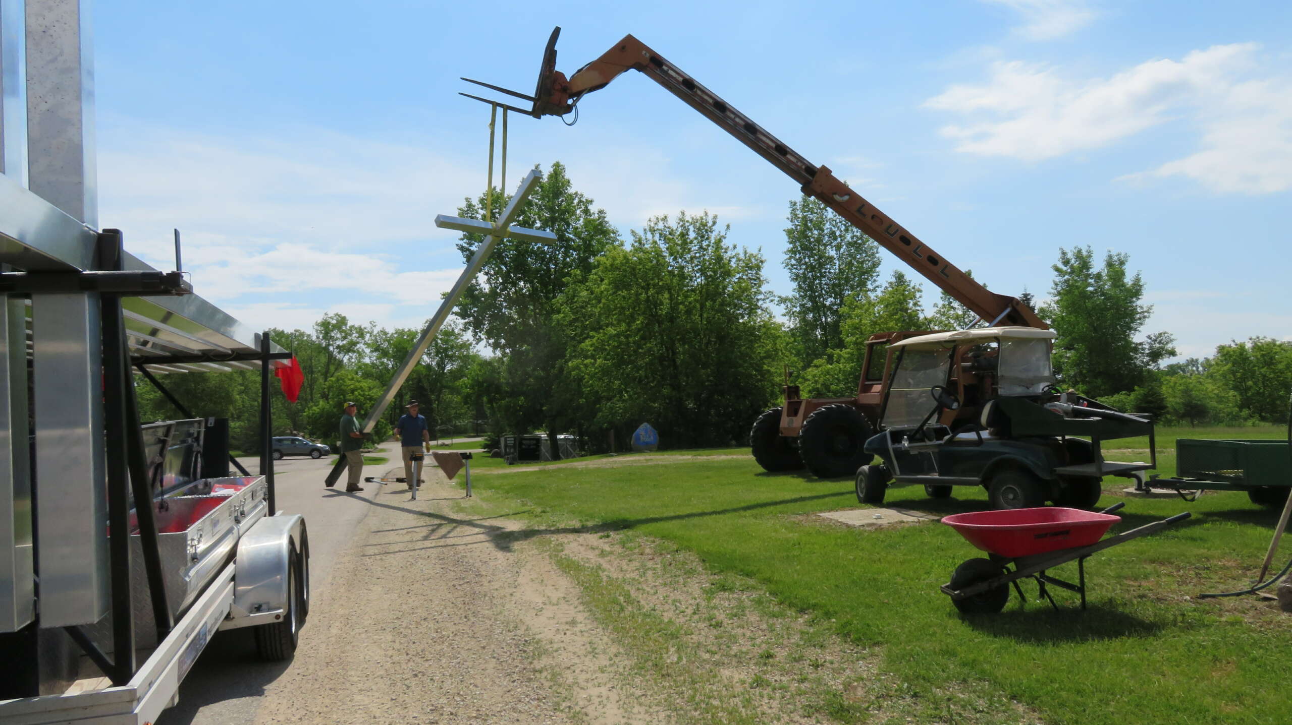 Lull Driven By Bob Bardwell Picks Up Cross | Christian Cross Ministries