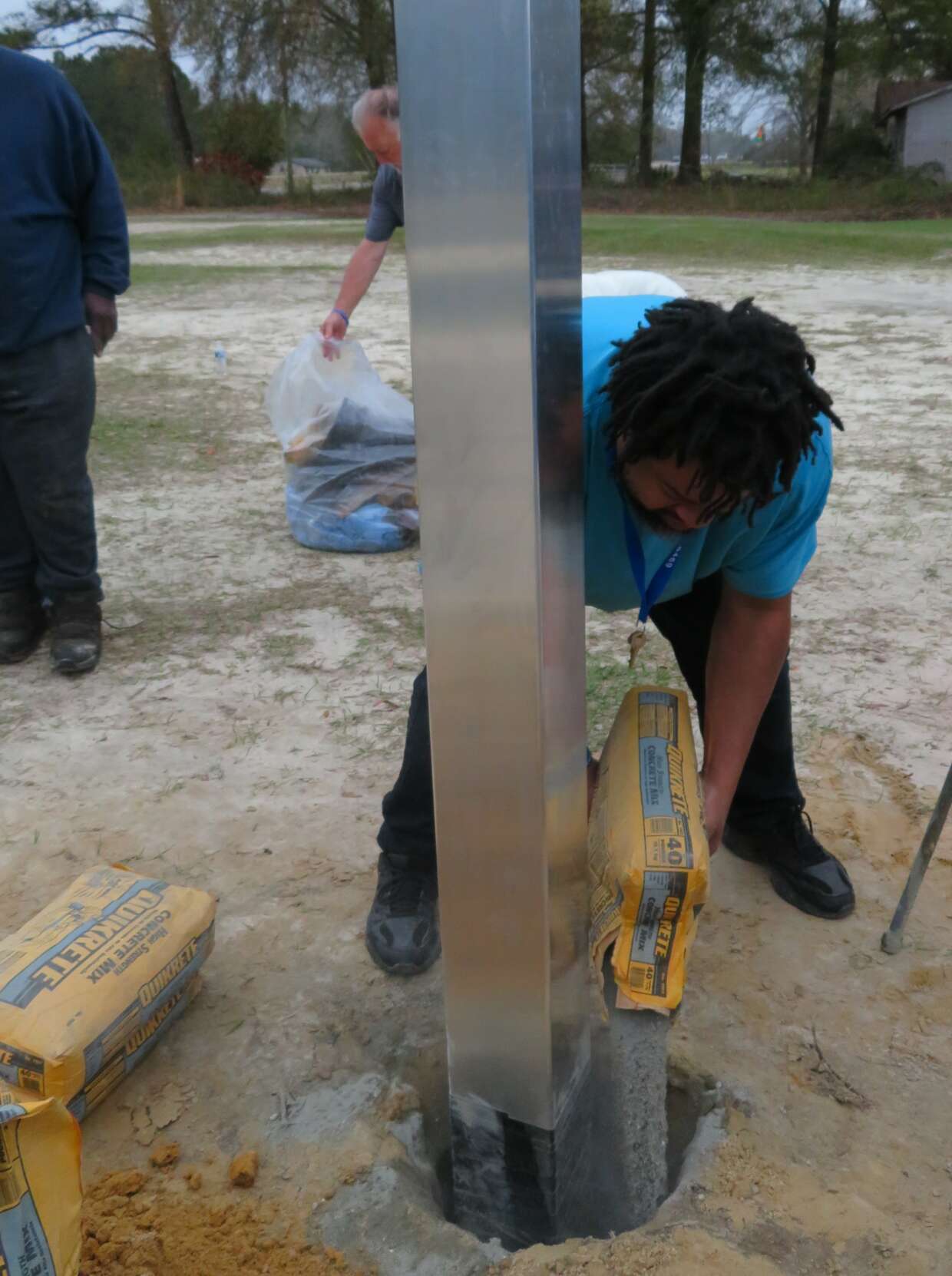 Securing With Concrete | Christian Cross Ministries